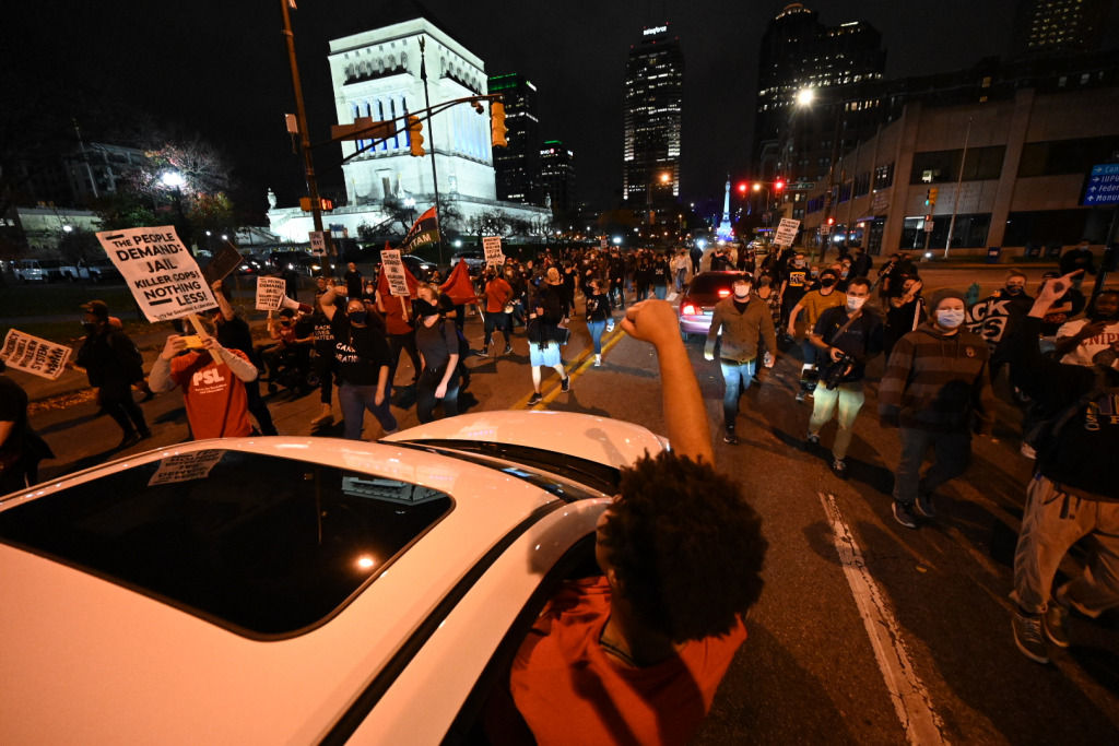 Protesters march through downtown—remaining peaceful—until rain ...
