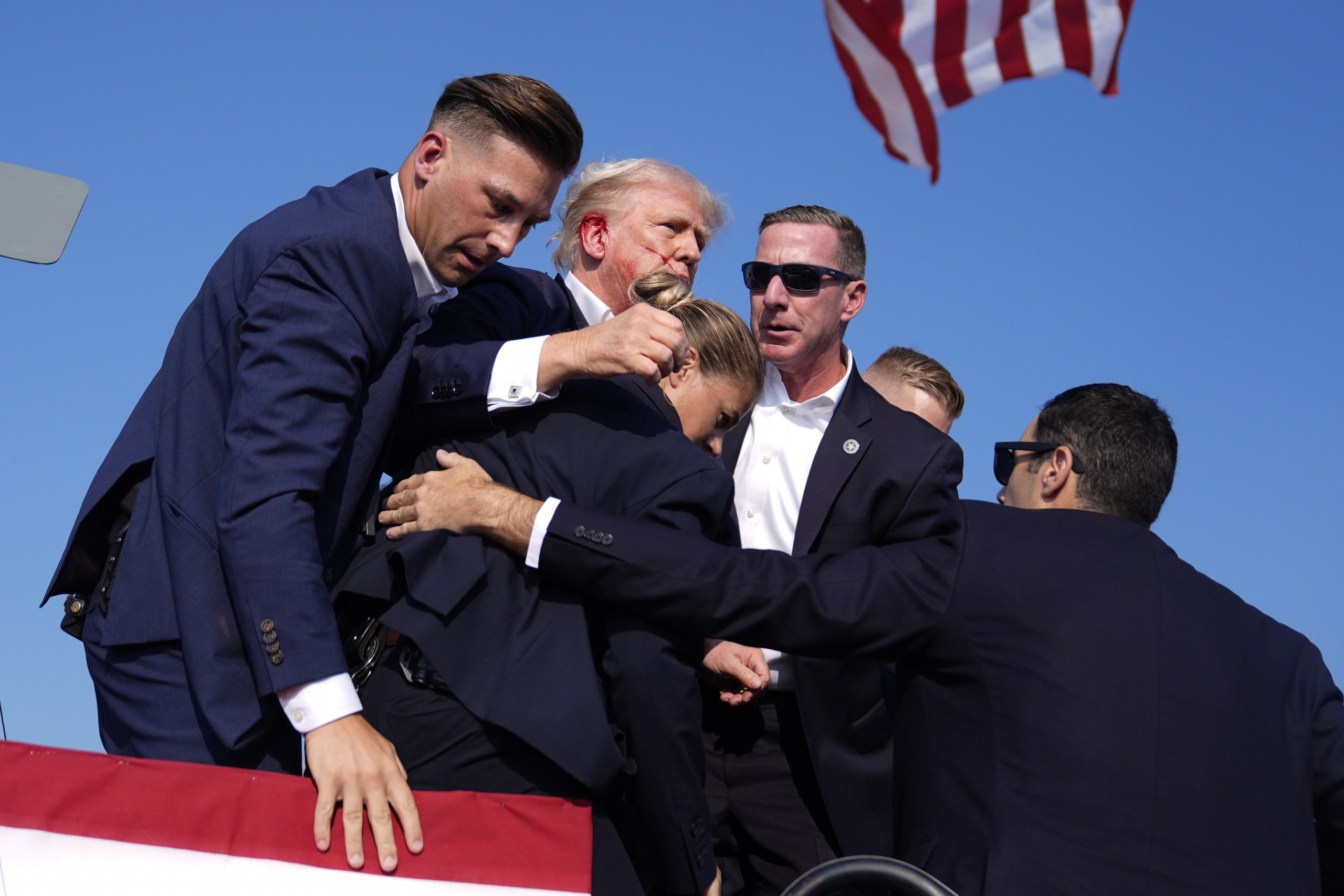 UPDATE: Trump injured in rally shooting; gunman and spectator dead ...