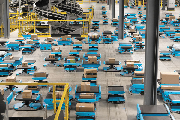 At Amazon’s Greenwood warehouse, humans and robots work side by side ...