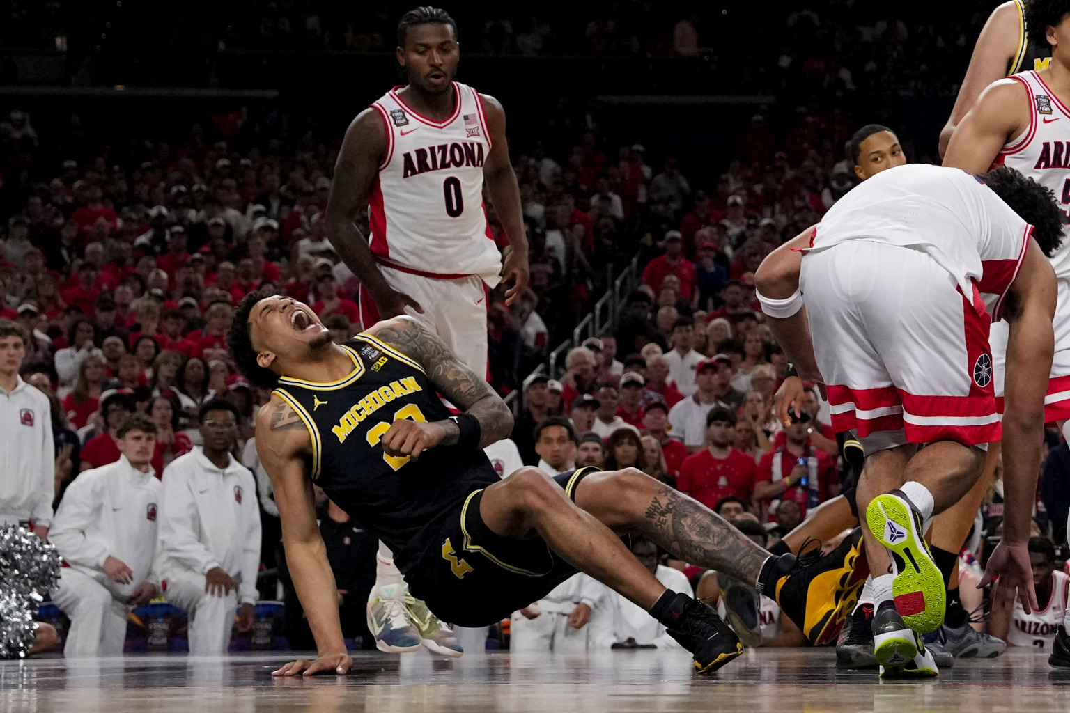 UConn’s Solo Ball, Michigan’s Yaxel Lendeborg both dealing with ...